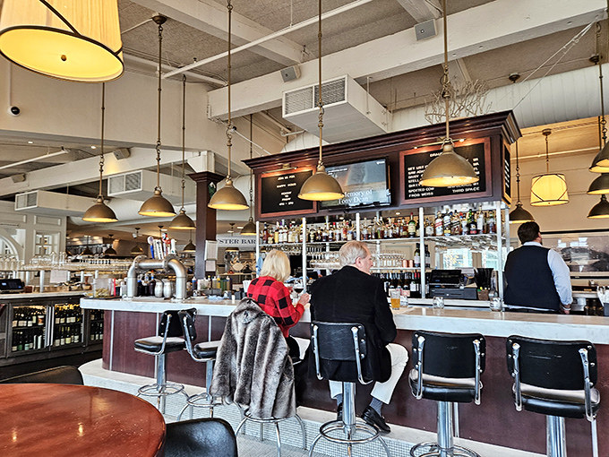 The bar where strangers become friends and cocktails become conversation pieces. Notice how nobody's looking at their phones?