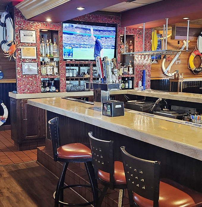 The bar area&mdash;where sports on TV and seafood on plates create the perfect formula for happiness in adult form.