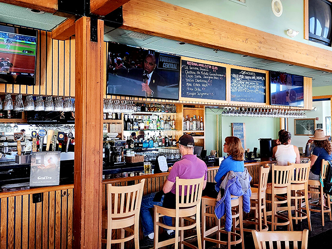 The bar area&mdash;where locals and tourists alike gather to swap fish tales that grow bigger with each perfectly mixed cocktail.