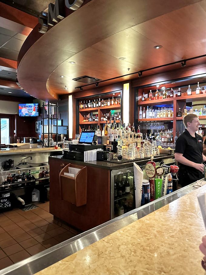 A bar stocked for serious business, where cocktails are crafted with the same attention to detail as the fire-kissed entr&eacute;es.