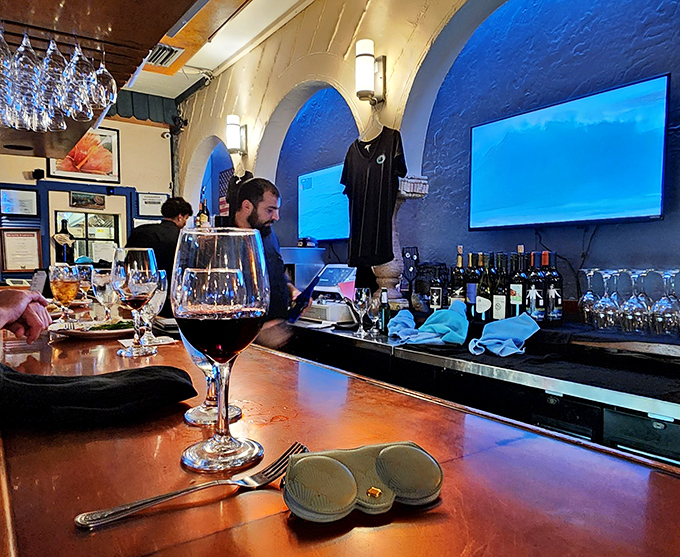 The bar area &ndash; where wine glasses await their moment to complement whatever oceanic delight you've wisely ordered.