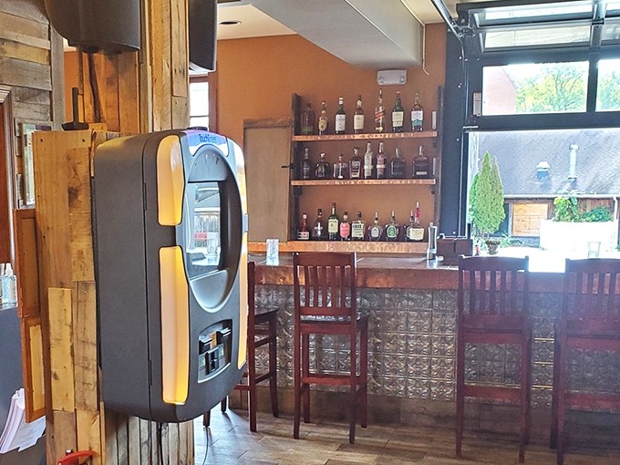 The bar area offers a front-row seat to the action, where you can watch cocktails being crafted while contemplating your seafood selection.