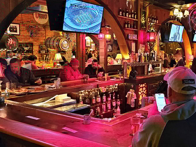 The bar area glows with a warm red light, beckoning you to pull up a stool and stay awhile &ndash; pizza paradise awaits.
