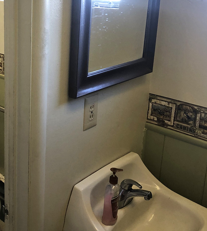 Even the bathroom maintains that classic diner aesthetic&mdash;no frills, just function, like a haiku written in porcelain and tile.