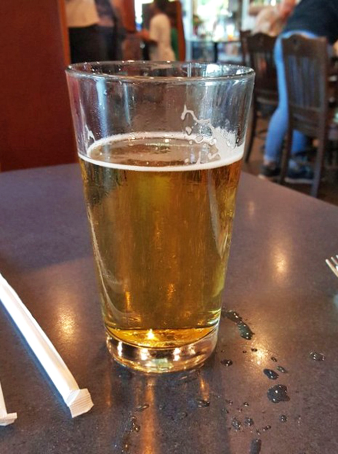 A cold beer in a proper glass—civilization's perfect answer to Georgia's humidity and a fitting companion to whatever deliciousness awaits.