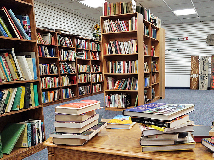 Literary treasures stacked and shelved, waiting for new readers. In this digital age, the tactile pleasure of physical books remains unmatched.