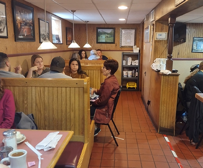 Families settling into booths like they're coming home &ndash; this is community dining at its finest.