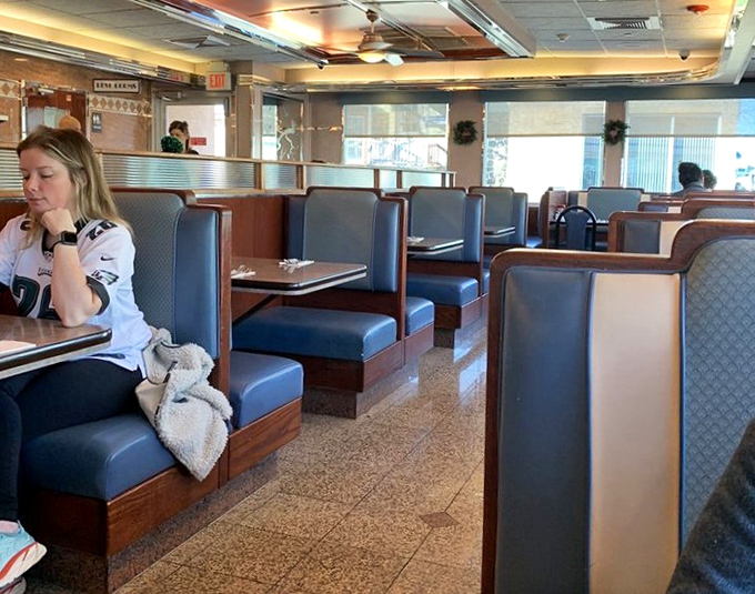 Booth seating that cradles you like a hug from your favorite aunt. The perfect vantage point for people-watching or serious menu contemplation. 