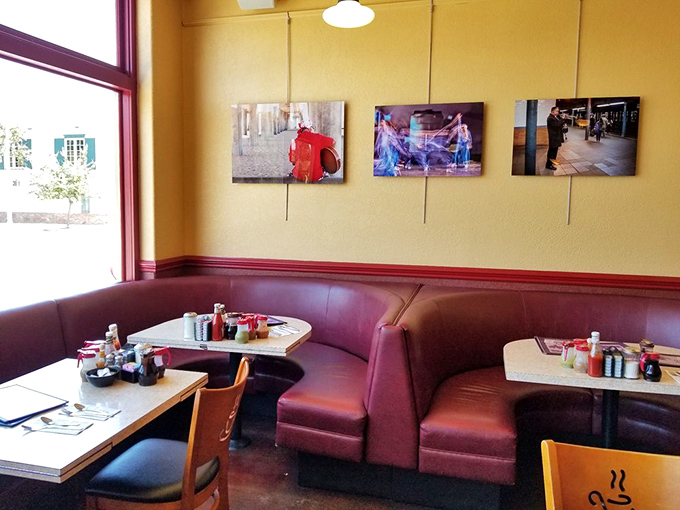 Booth seating that's witnessed more life stories than a therapist's couch, only cheaper.