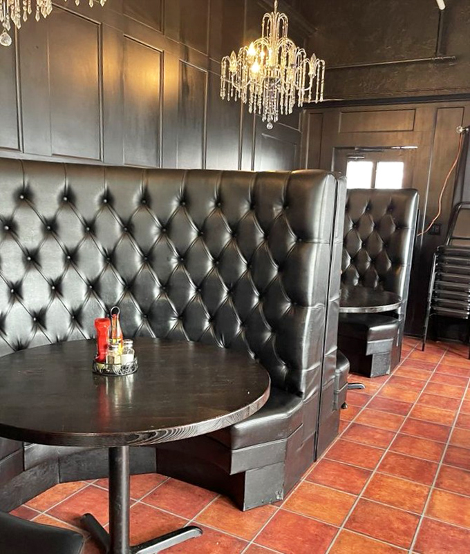 Tufted leather booths under crystal chandeliers create unexpected elegance&mdash;like your sophisticated aunt who still knows how to party when the occasion calls.