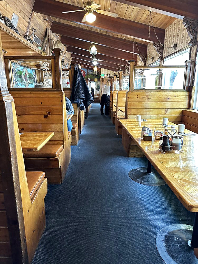 The dining room's wooden booths offer semi-private dining nooks&mdash;perfect for plotting your day's adventures or recovering from yesterday's.