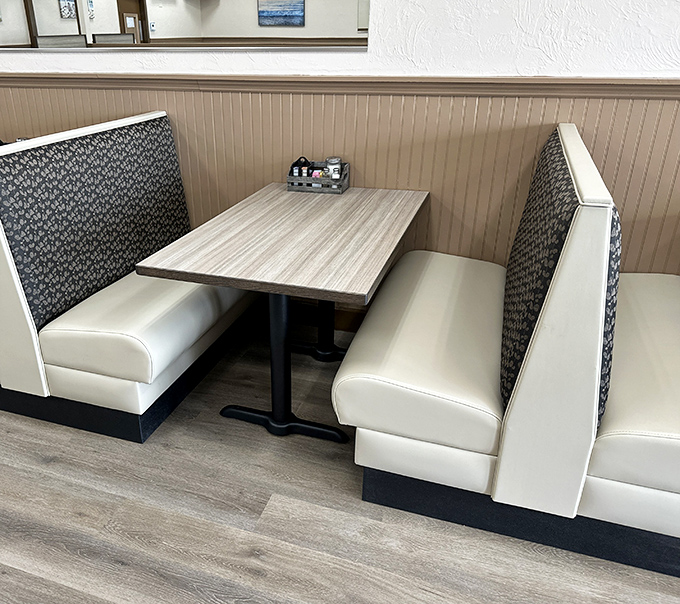 A booth that promises privacy for important discussions like "Should we split dessert?" (The answer is always yes.)