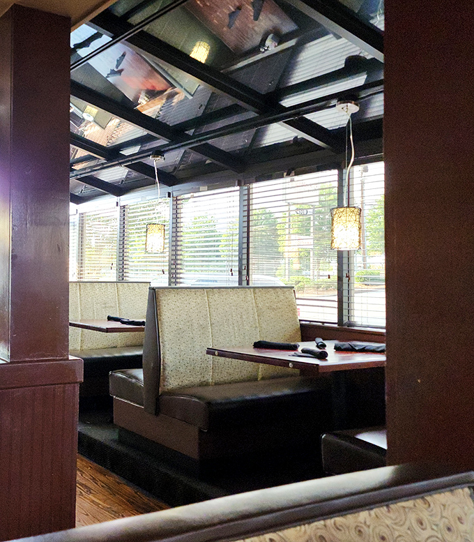Cozy booths bathed in natural light create the perfect setting for lingering conversations. The kind of spot where "just coffee" turns into dessert.