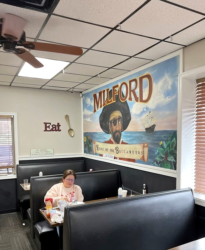 The Milford mural watches over diners like a benevolent guardian, celebrating the town's maritime heritage while you celebrate breakfast.