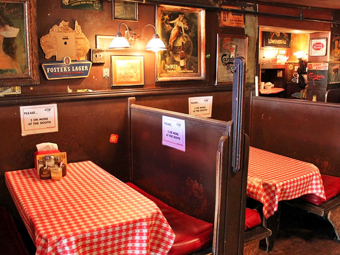 These booths have witnessed first dates, business deals, and tourists trying to figure out how to eat a sandwich bigger than their face.
