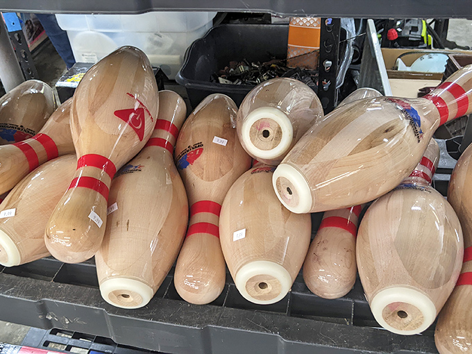 Not bowling pins but wooden mallets waiting for their next croquet match! Imagine the backyard tournaments these beauties could inspire.