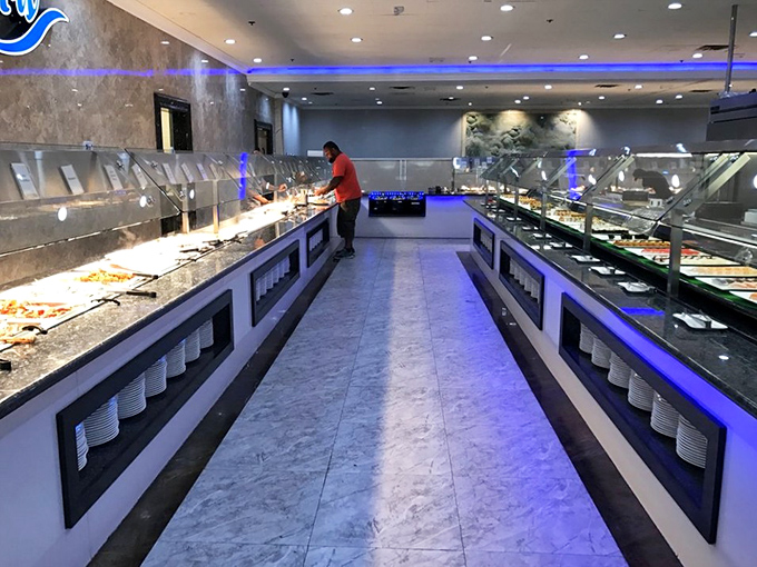 A buffet corridor that stretches like a runway of possibilities. This is what dreams look like to the perpetually hungry.