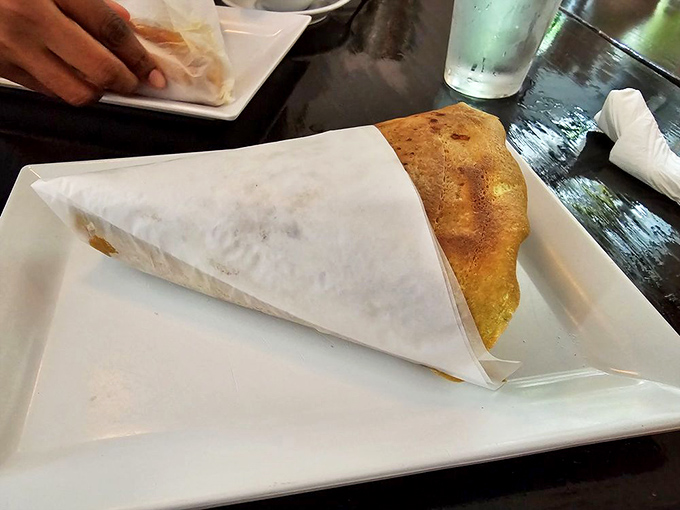 Handheld happiness wrapped in paper. This portable feast proves that sometimes the best dining room is wherever you happen to be standing.