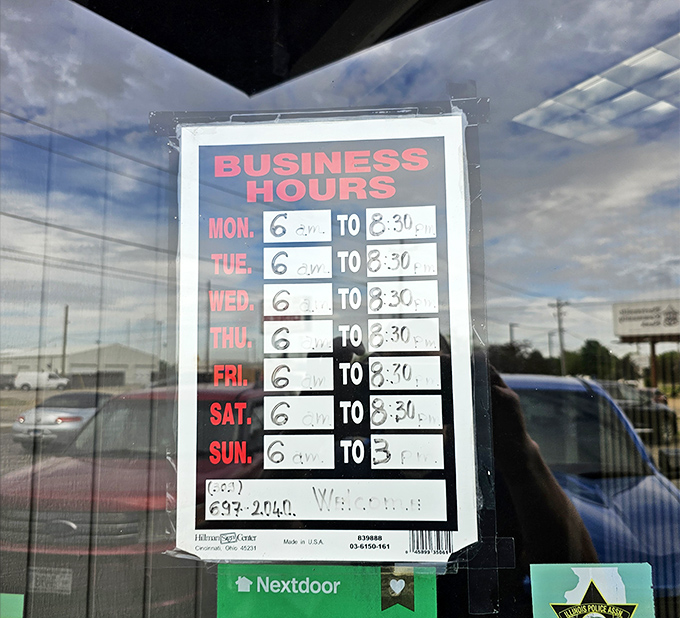 Business hours posted with Midwestern precision. They open at 6am because in diner time, that's practically mid-morning for the farmers and early birds.