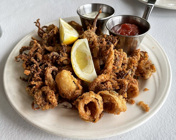 Calamari that crackles with golden perfection &ndash; tender within, crispy without, and impossible to stop eating once you start.