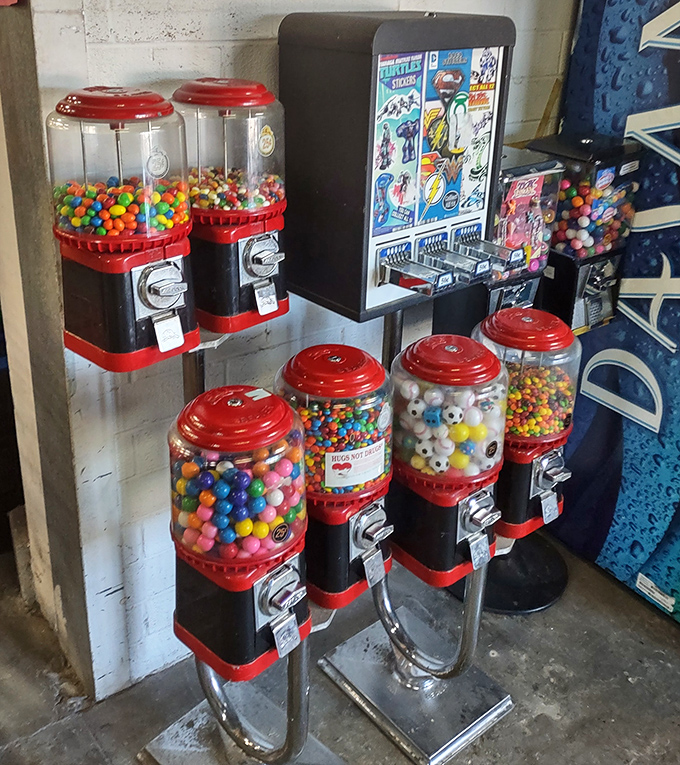 Vintage candy machines stand guard near the checkout, tempting you with colorful spheres of sugar while you wait in line.