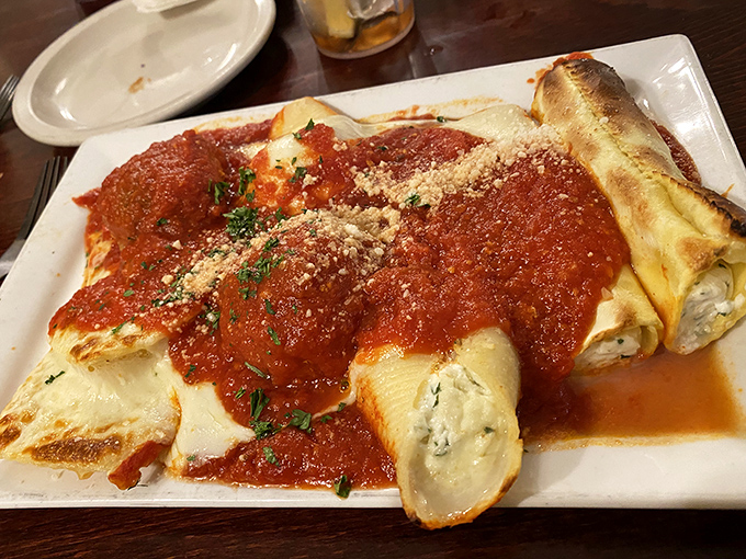These cannelloni, blanketed in rich tomato sauce and dusted with parmesan, aren't just pasta &ndash; they're edible therapy after a long week.