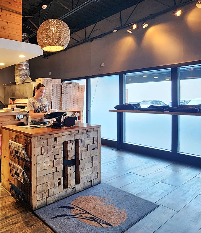 The host stand&mdash;where pizza dreams begin. Simple, rustic, and welcoming, like the first chapter of a delicious story.