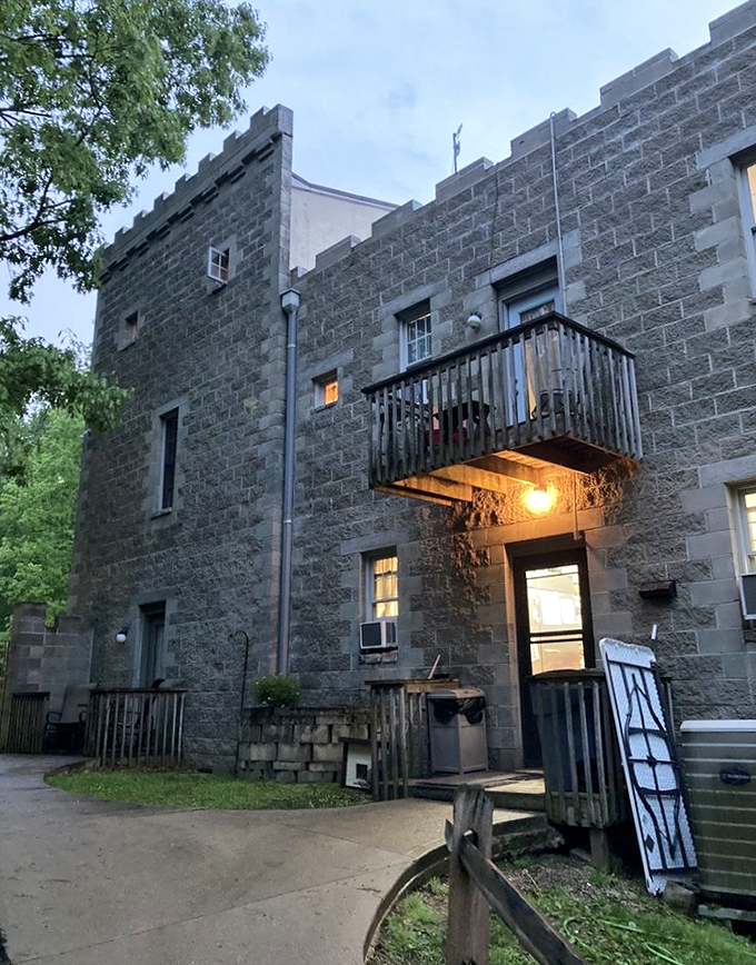 The castle's side entrance reveals thoughtful details&mdash;ornate lighting fixtures and balconies that transport you straight into a medieval daydream.