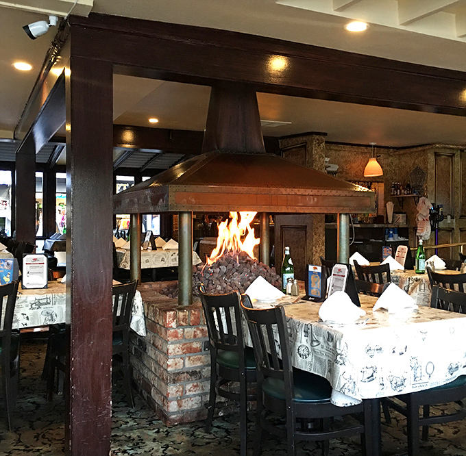 The central fireplace doesn't just warm the room&mdash;it hypnotizes diners into believing they've found the cozy heart of seafood paradise.