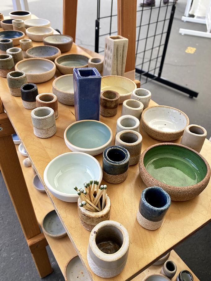 Handcrafted pottery in soothing earth tones that would make Marie Kondo proud. Minimalism never looked so artfully arranged on a wooden table.