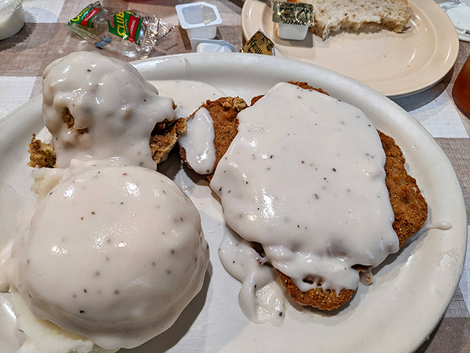 Country fried steak swimming in gravy so good you'll want to request a straw. The mashed potatoes aren't just a side&mdash;they're an essential life experience.
