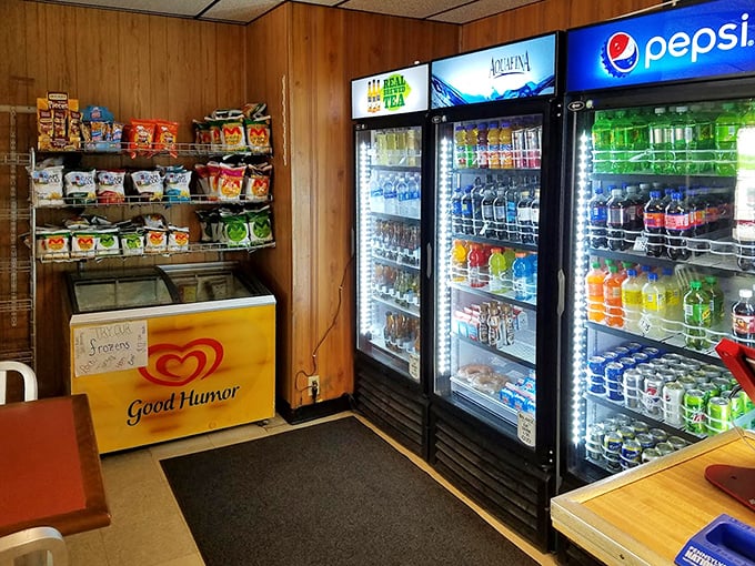 The snack corner proves Stookey's knows its priorities—barbecue first, but chips and cold drinks are essential supporting actors in this culinary production.