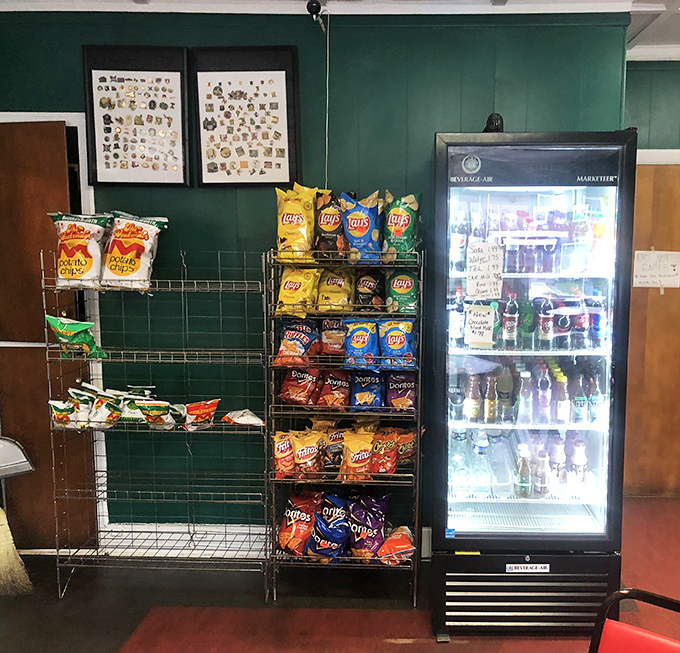 Snack heaven awaits while you contemplate your order. Those chip racks have witnessed countless moments of delicious deliberation.