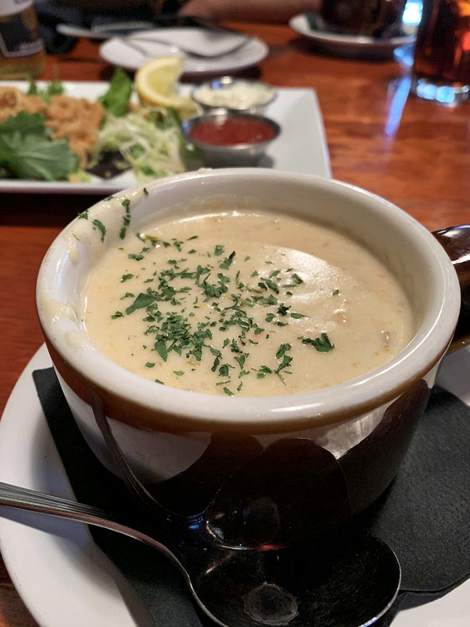 Clam chowder so velvety it should be illegal. The sprinkle of fresh herbs is like putting a bow on an already perfect package.