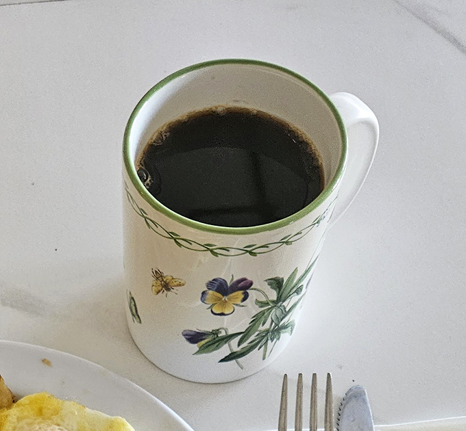 Their coffee comes in mugs with personality, not those dainty cups that leave you wanting more. This is serious morning fuel for serious breakfast enthusiasts.
