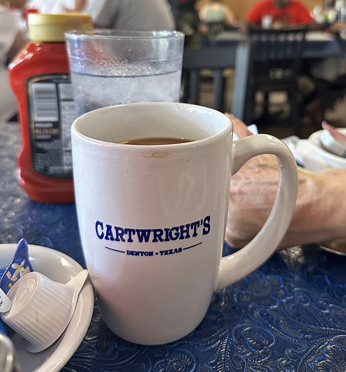 Coffee served in a mug substantial enough to double as a hand-warmer, emblazoned with the Cartwright's logo&mdash;a promise that refills are part of the experience.