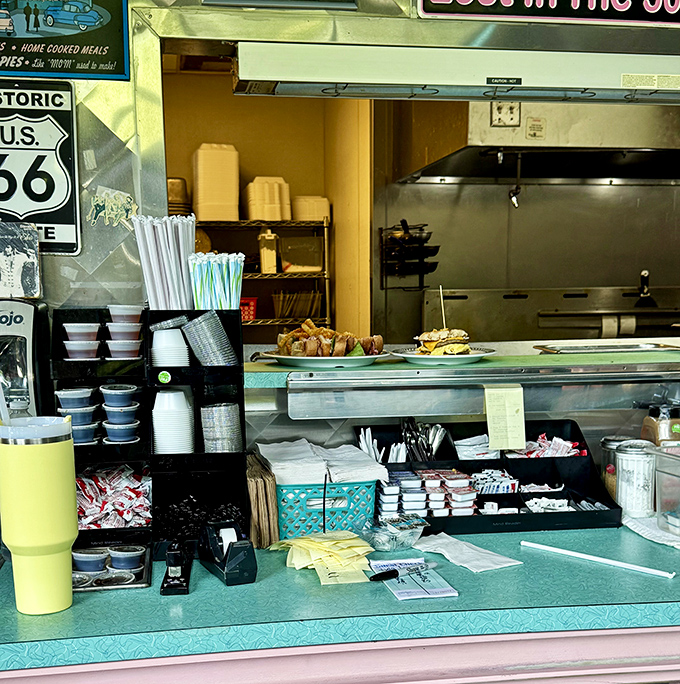 Behind the scenes of breakfast perfection: the organized chaos of condiments and to-go containers that keeps this diner humming like a well-oiled machine.