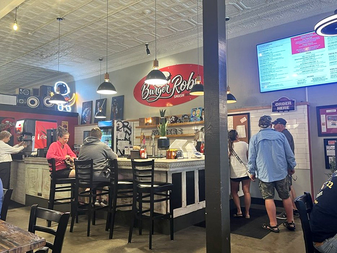 The counter area buzzes with anticipation as customers place orders, like pilgrims who've finally reached their culinary Mecca.