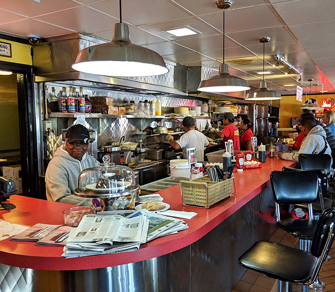 The counter&mdash;where solo diners find community, newspapers find purpose, and coffee cups never stay empty for long.