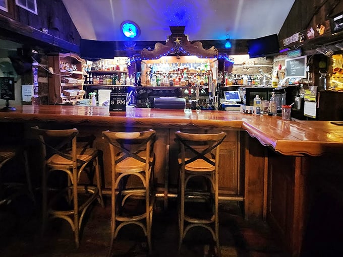 The bar gleams with warm wood and soft lighting, promising craft cocktails and local tales in equal measure.