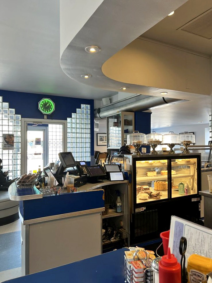 The counter and display case—where dessert dreams are born and difficult decisions must be made about which pie slice comes home with you.