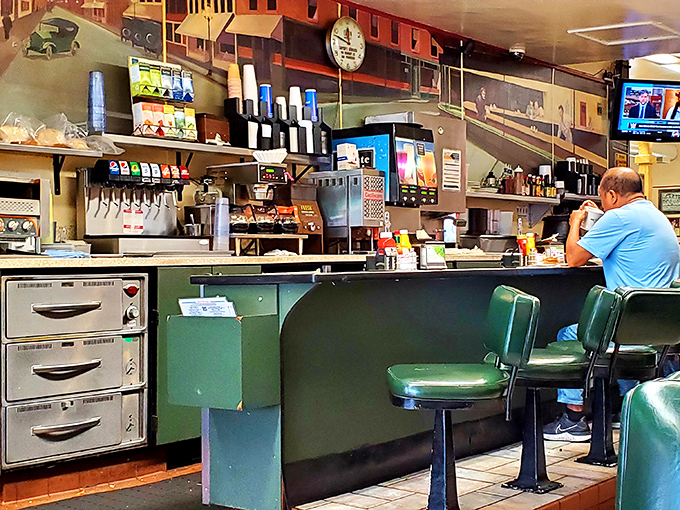 The counter where breakfast dreams come true &ndash; a front-row seat to the symphony of sizzles and clanks that is diner percussion.