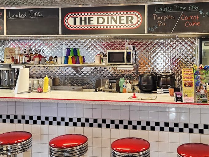 The counter gleams with promise, where friendly banter flows as freely as the coffee. This is democracy in diner form.