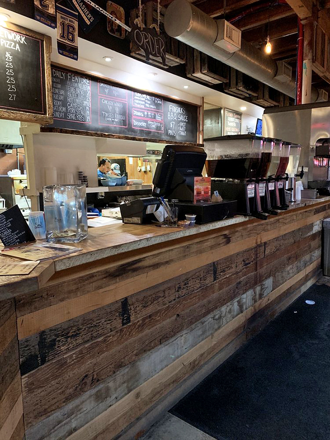 The order counter&mdash;where BBQ dreams begin. Those chalkboard menus hold the promise of smoky delights to come.