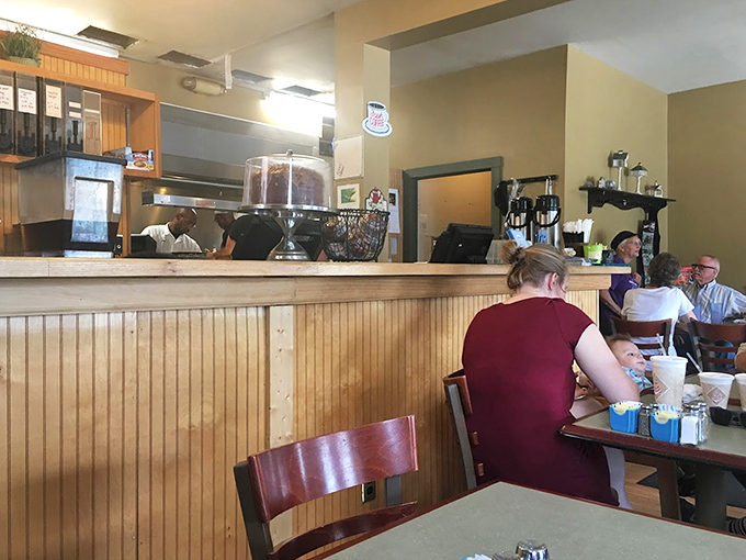 Where breakfast magic happens. The kitchen counter view offers a glimpse into the choreographed dance of diner cooking.
