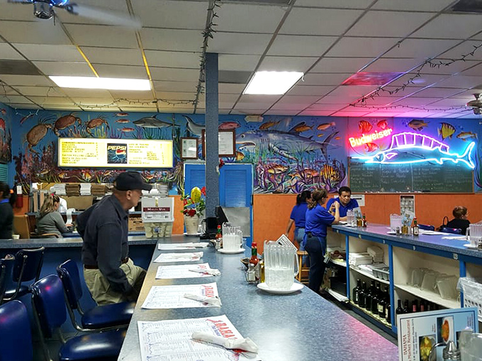 Where counter culture meets seafood culture. The neon fish sign glows like a beacon, guiding hungry patrons to their next great meal.