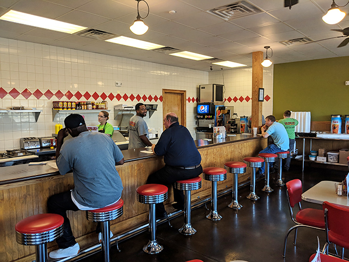 Counter seats: where strangers become neighbors and regulars become family. The heart of any great diner is this sacred space.