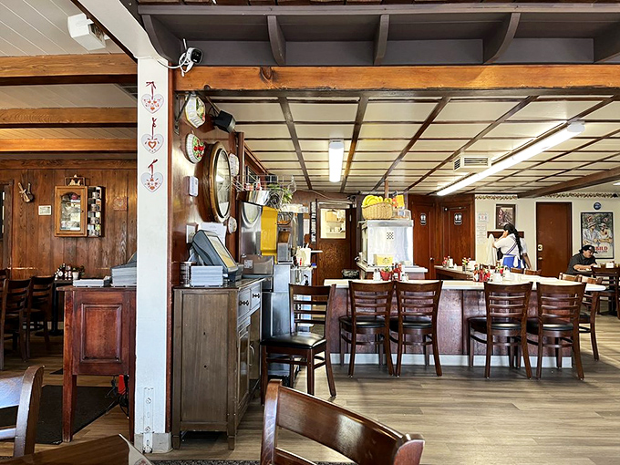 The counter offers front-row seats to the breakfast ballet, where servers and cooks perform their morning choreography with practiced precision.