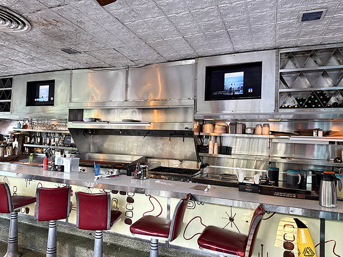 Where culinary magic happens. The open kitchen and counter seating let you witness the choreography of short-order cooking at its finest.