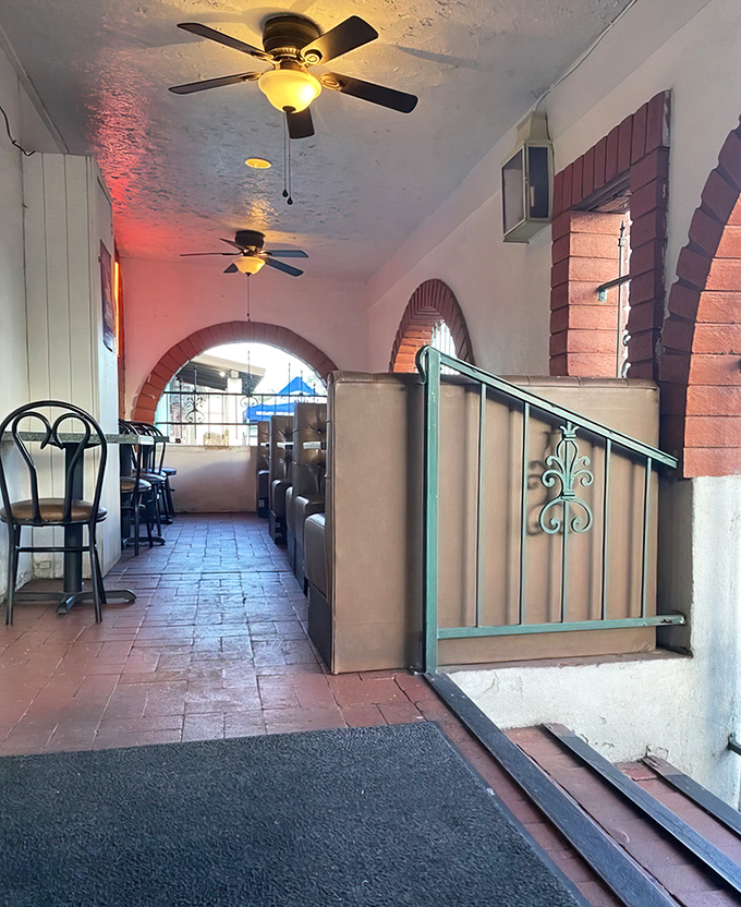 The entryway reveals more of those signature arches, creating a welcoming path to your table. Architecture that whets the appetite.
